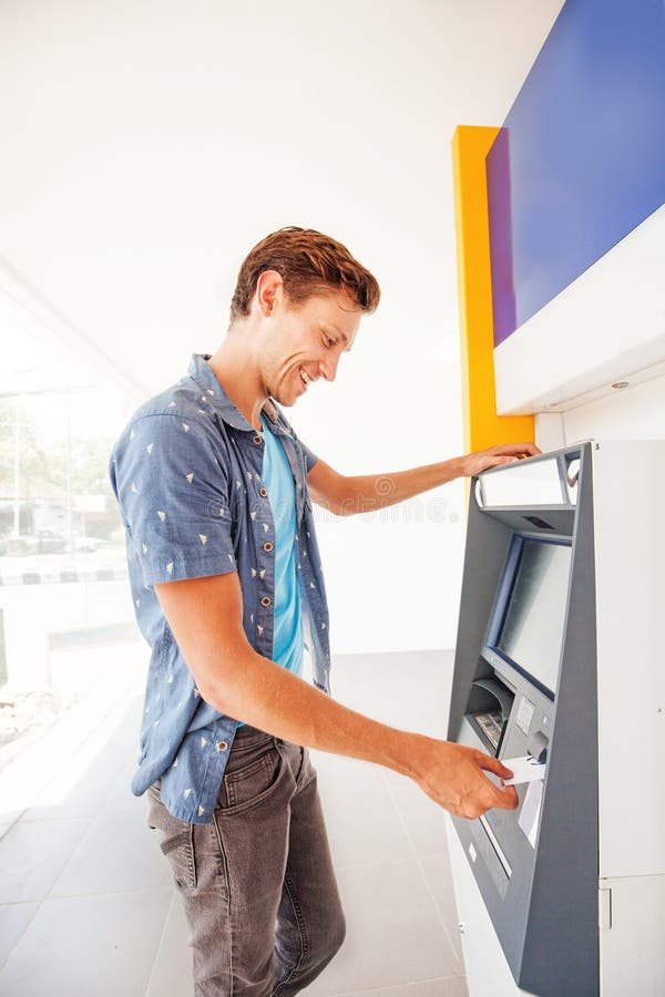 Withdrawing money stock image. Image of money, withdrawing - 79705989