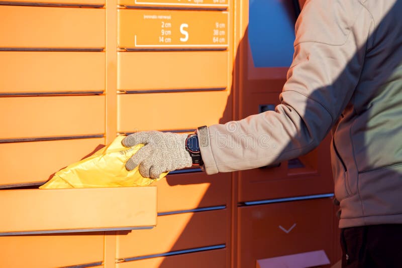 Man Using Automated Self Service Post Terminal Machine or Locker Stock ...