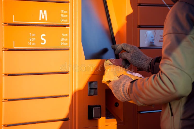 Man Using Automated Self Service Post Terminal Machine or Locker Stock ...