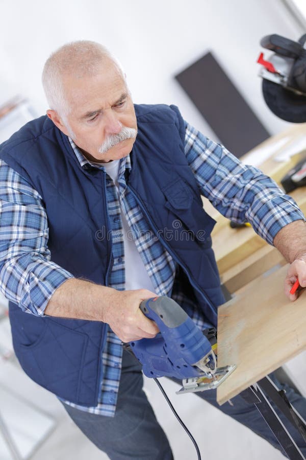Man using band saw stock photo. Image of carpentry, hand - 89109806