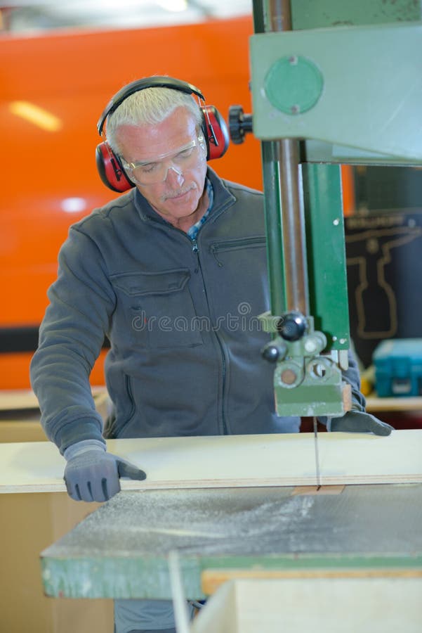 Man using bench saw stock photo. Image of timber, male - 124016844