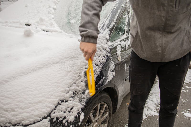 Man Using Brush To Remove Snow from the Car Stock Image - Image of ...