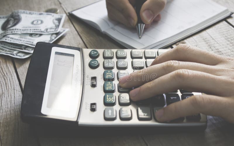 Man Using Calculator Counting Making Notes at Office Hand is Writes in ...