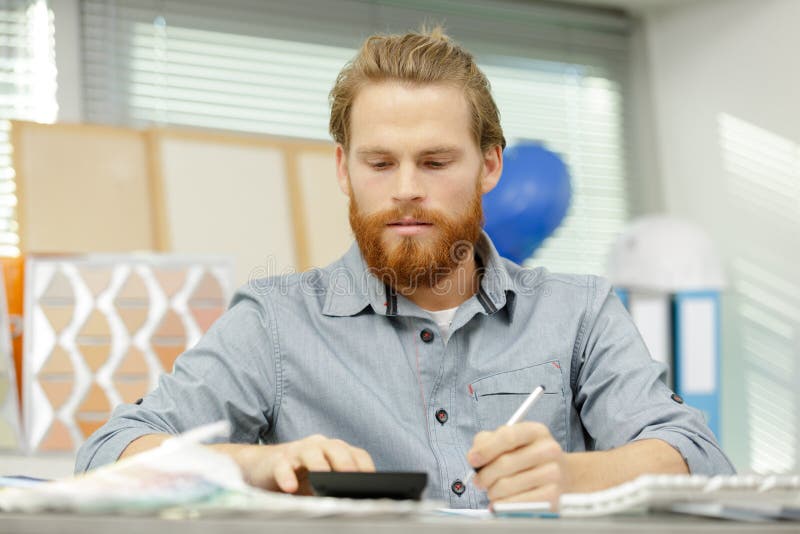 Man Using Calculator at Desk Stock Image - Image of home, budget: 263006493 Man Using Calculator at Desk Stock Image - Image of home, budget: 263006493