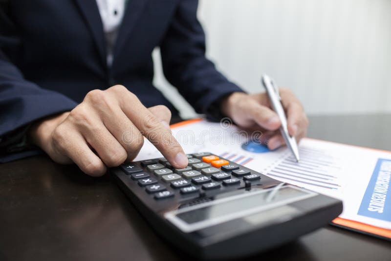 Man Using Calculator and Writing Make Note with Calculate Stock Image ...