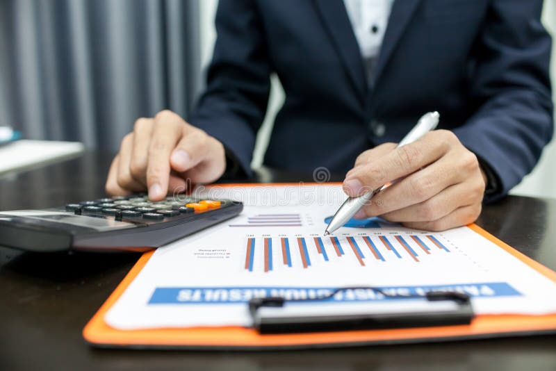 Man Using Calculator and Writing Make Note with Calculate Stock Image ...