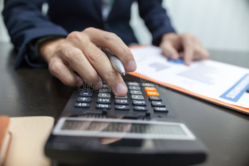 Man Using Calculator and Writing Make Note with Calculate Stock Image ...