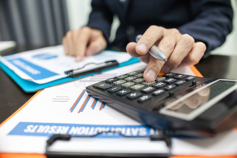 Man Using Calculator and Writing Make Note with Calculate Stock Image ...