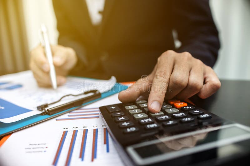 Man Using Calculator and Writing Make Note with Calculate Stock Photo ...