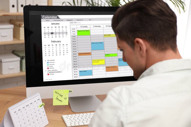 Man Using Calendar App on Computer Stock Photo - Image of adult ...