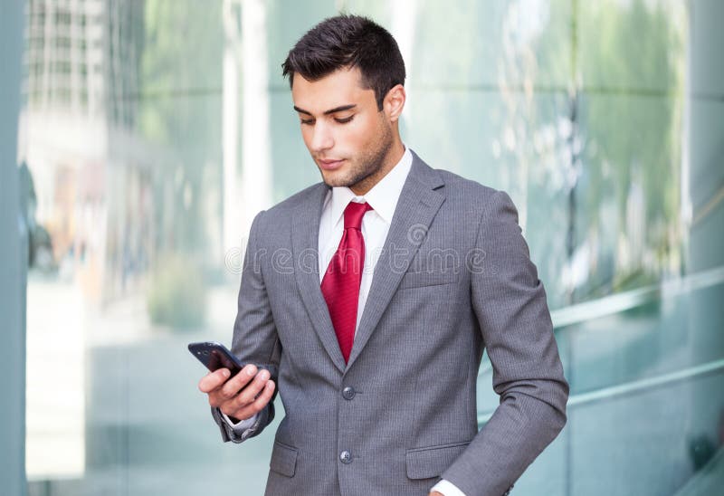 Man holding cell phone stock image. Image of businessperson - 52857617