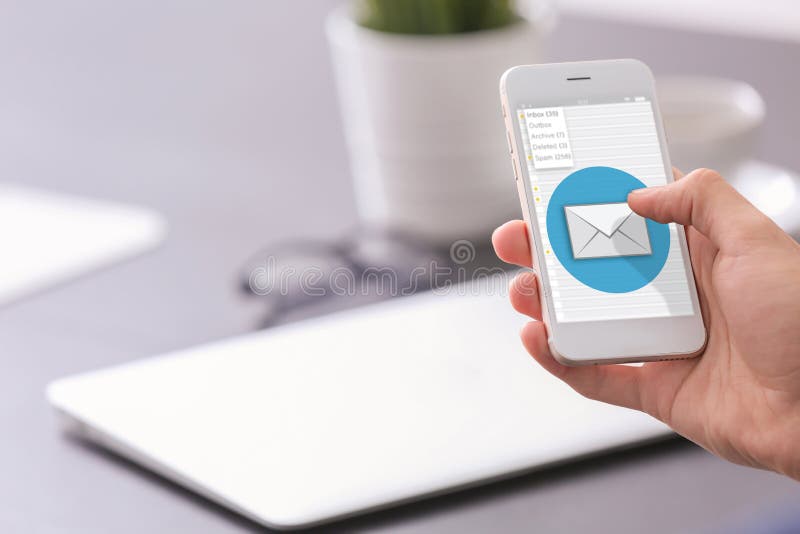 Man Using Cellphone To Check an Email at Workplace, Closeup Stock Photo ...