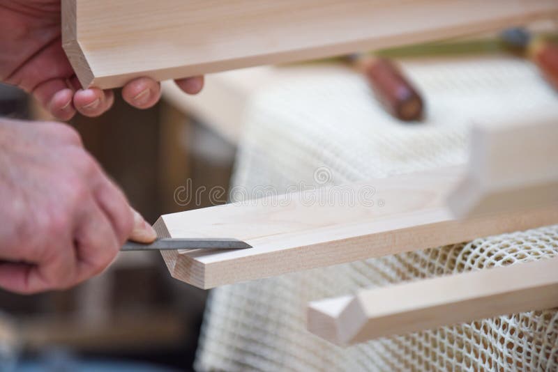 Man is Using a Chisel To Shape and Carve Wood in Carpentry Stock Image ...