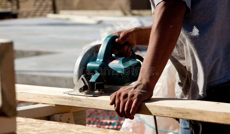 Man Using Circular Saw on Wood Stock Image - Image of caution, blade ...