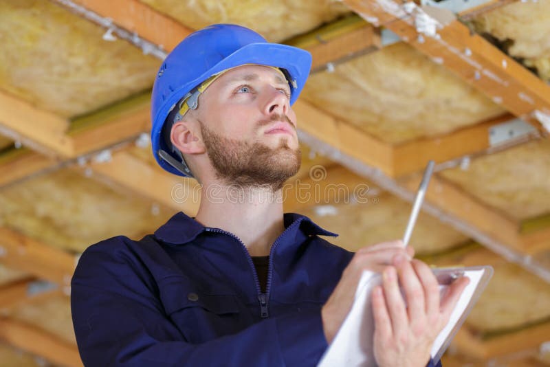 Man using clipboard safety stock photo. Image of equipment - 261514058