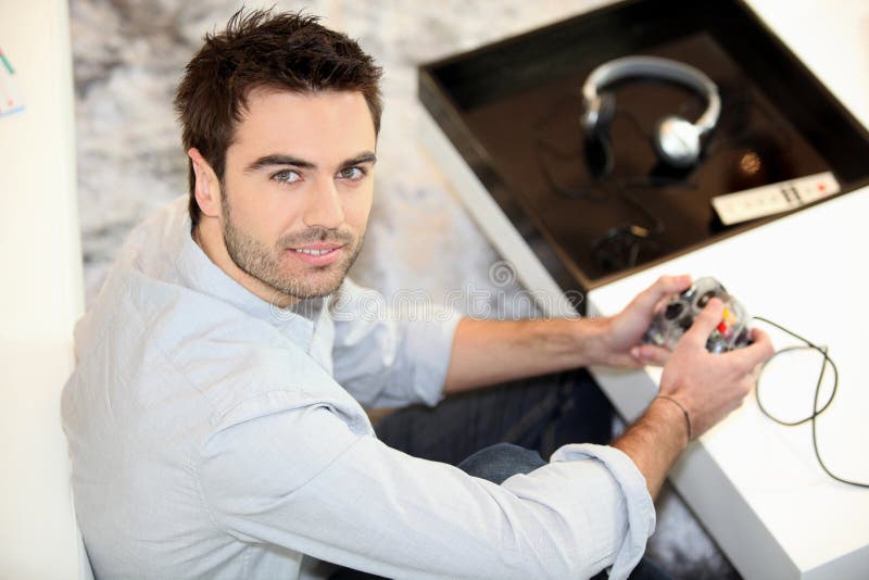 Man using computer console stock photo. Image of console - 22536398