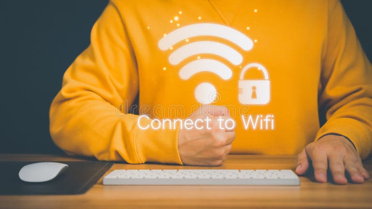 Man Using a Computer Keyboard To Connect To Wifi and Waiting To Loading ...
