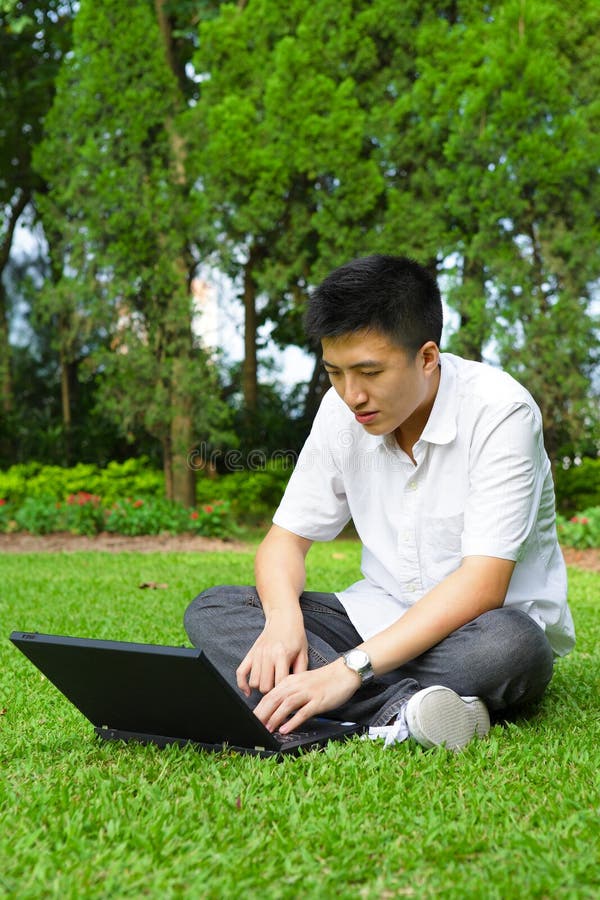 Man using computer outdoor stock photo. Image of computer - 16036908