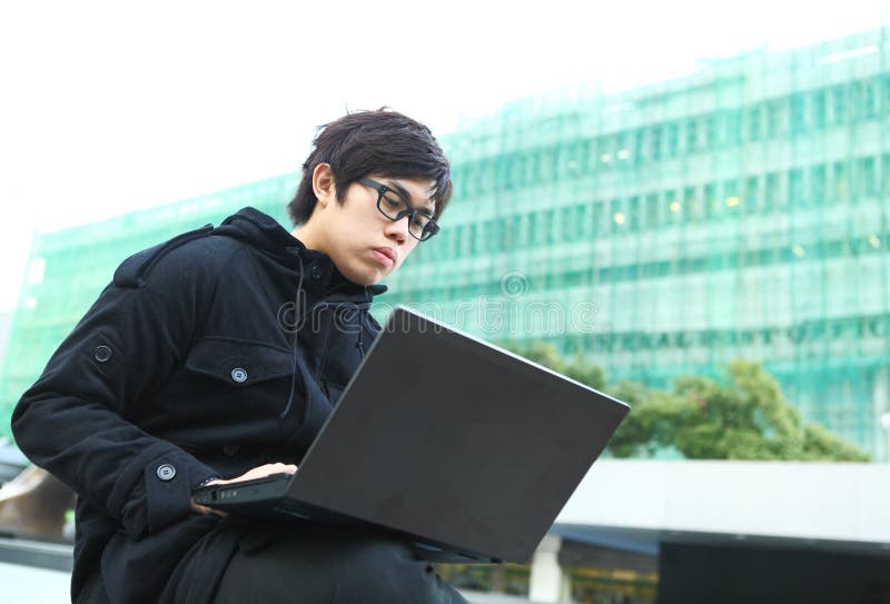 Man using computer outdoor stock image. Image of beautiful - 30809413