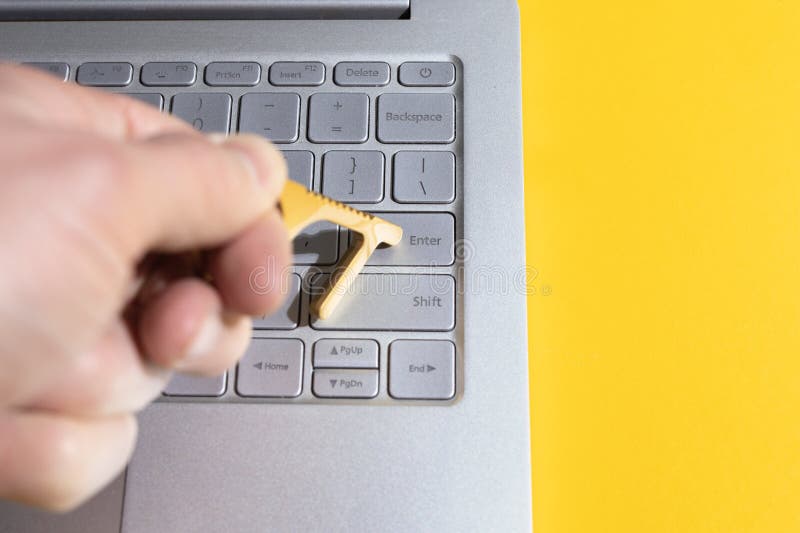 Man Using Contactless Tool To Press Laptop Button and Prevent Spread of ...