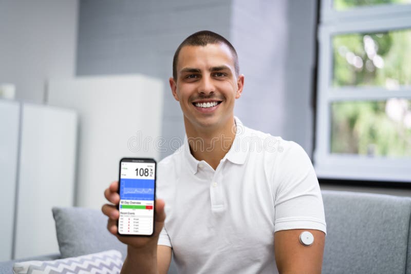 Man Using Continuous Glucose Remote Monitor Stock Photo - Image of ...