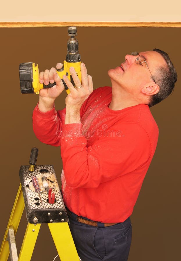 Man Using Cordless Electric Drill Stock Image - Image of panel, remodel ...