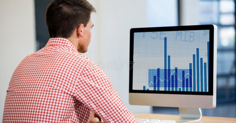 Man Using Desktop Computer Displaying a Graph Chart on Screen Stock ...