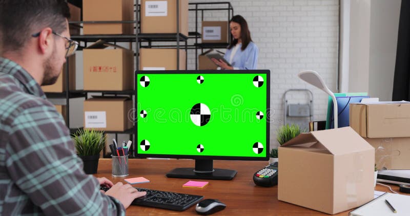 Man Using Desktop Computer with Green Chromakey Screen. a Man and a ...