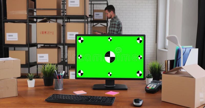 Man Using Desktop Computer with Green Screen Chromakey in the ...