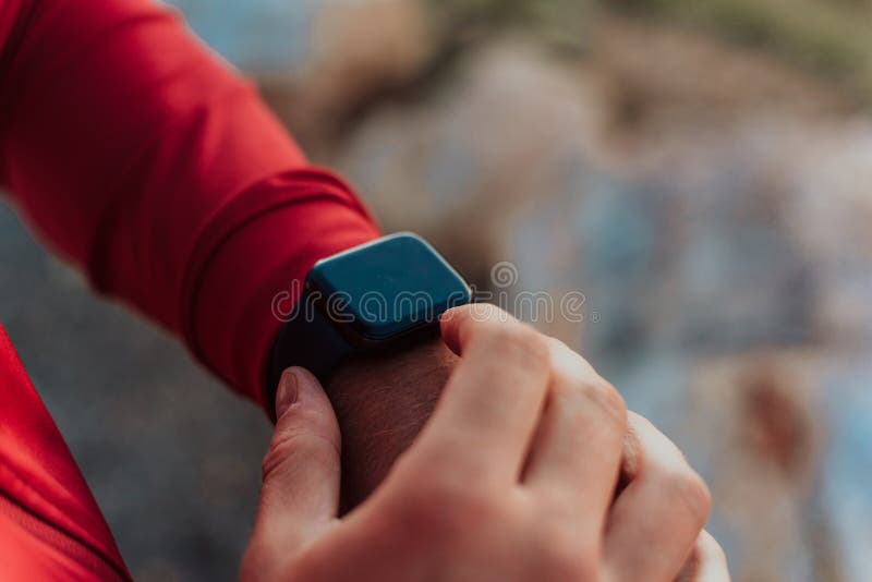 Man Using a Digital Smartwatch during Workout. Closeup View of Man& X27 ...