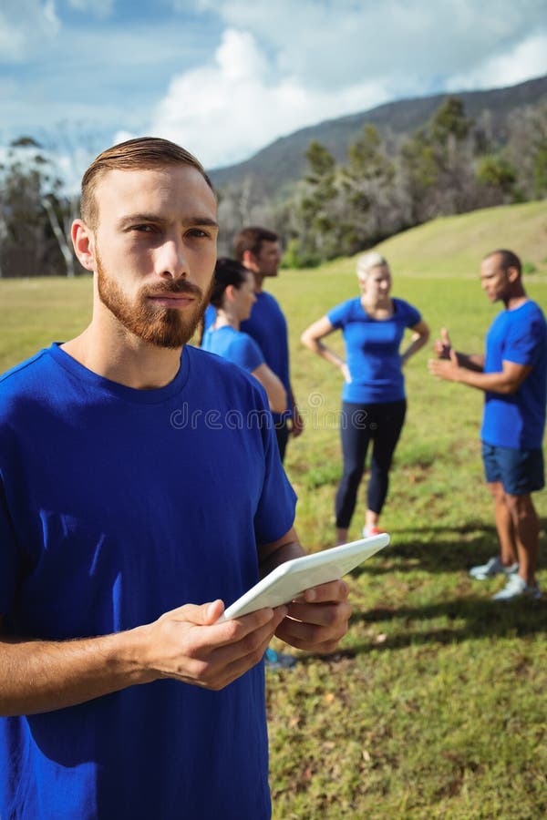 Man Using Digital Tablet in Boot Camp Stock Image - Image of computer ...