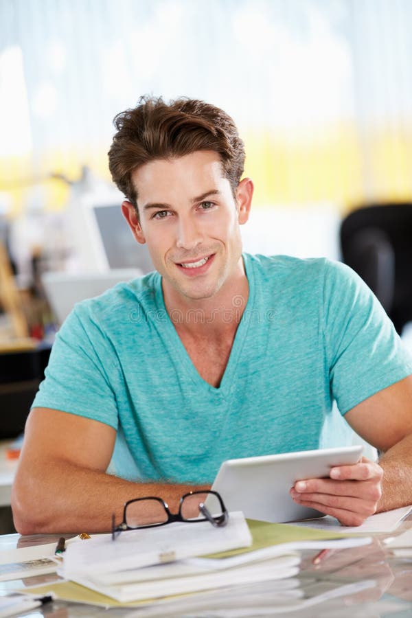 Portrait of Man Standing in Busy Creative Office Stock Photo - Image of ...