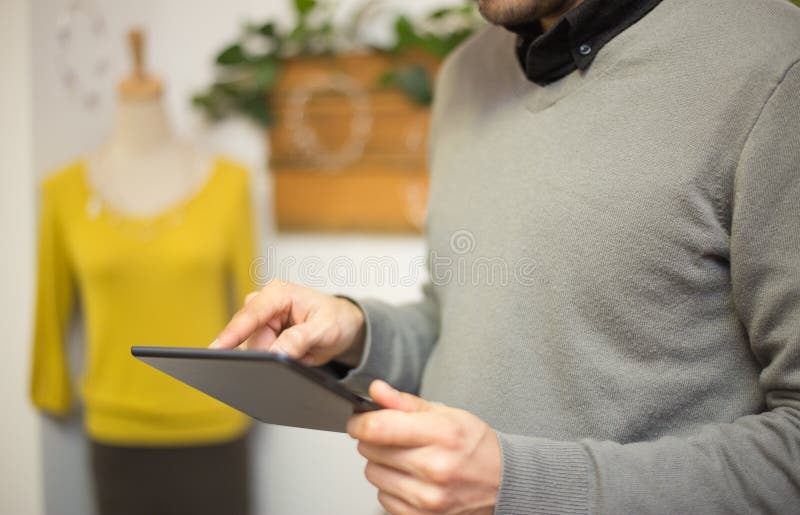 Man Using a Digital Tablet in Store Stock Image - Image of digital ...