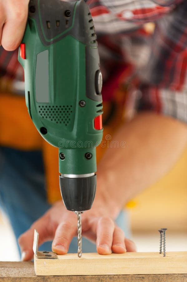 Using a Drill Press To Drill a Hole Steel Rod Stock Image - Image of ...