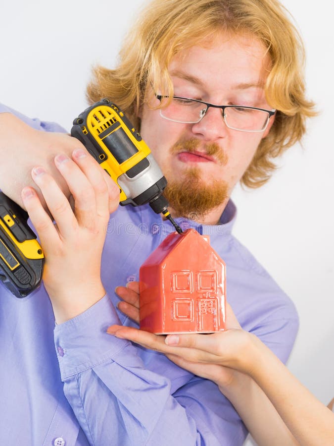 Man Using Drill on Home Model Stock Image - Image of builder, house ...