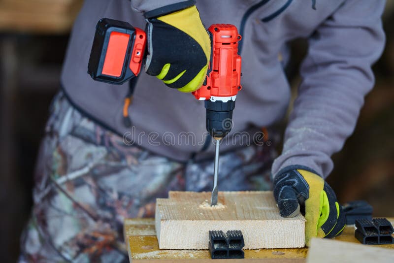 Man Using Drilling Machine on Wood Stock Image - Image of person, hobby ...