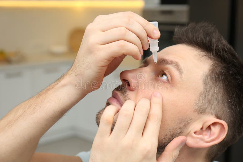 Man Using Drops for Eyes at Home Stock Photo - Image of antiseptic ...
