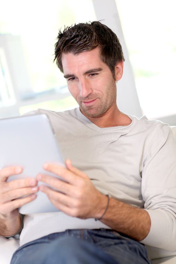 Man Using Electronic Tablet Stock Photo - Image of adult, social: 21748584