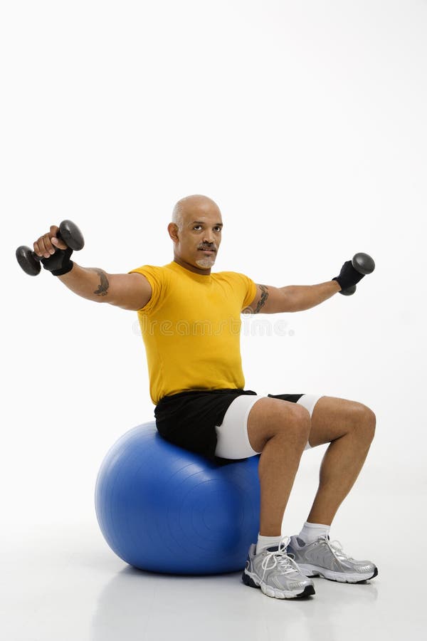 Man using exercise ball. stock photo. Image of clothing - 2772386