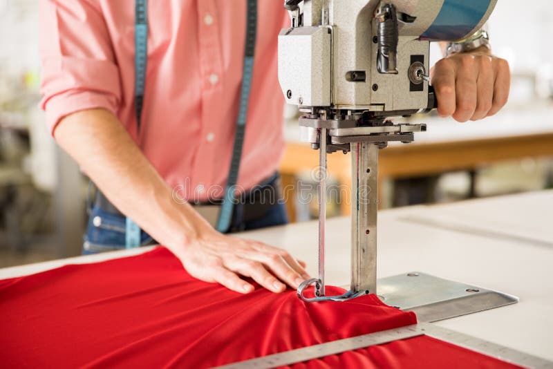 Man cutting fabric stock image. Image of mark, tools, material - 4379879