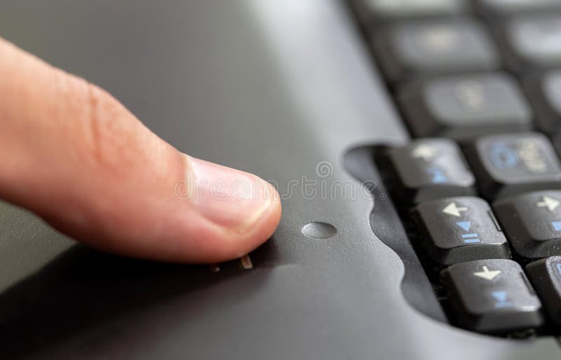 Man Using a Fingerprint Scanner Module Built into a Laptop, Finger ... Man Using a Fingerprint Scanner Module Built into a Laptop, Finger ...