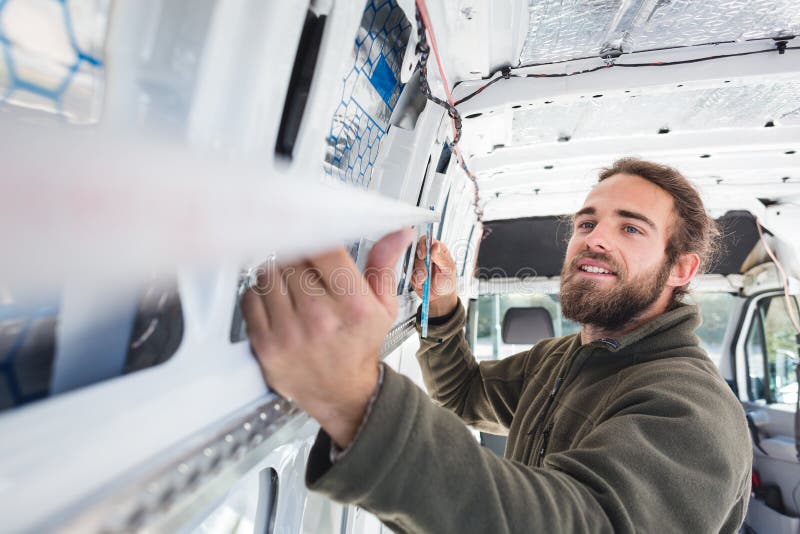 Man Using a Folding Rule Inside a Van Stock Image - Image of lifestyle ...