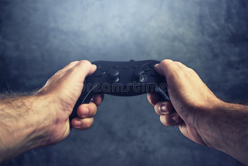 Man Using Gamepad Controller To Play Video Games Stock Photo - Image of ...