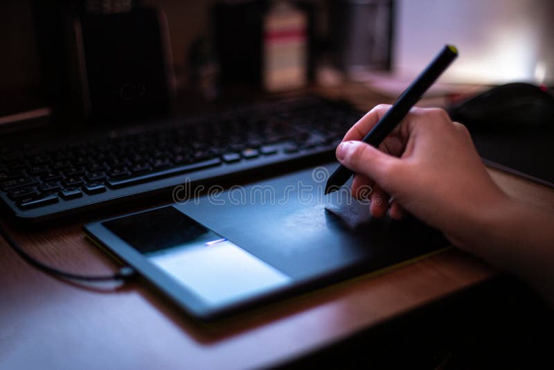 A Man Using Graphic Tablet with Pen Working on New Project Idea Stock ...