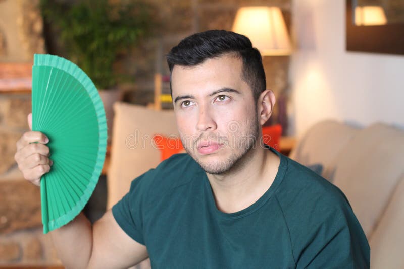 Man Using Hand Fan during Heatwave Stock Photo - Image of irritated ...