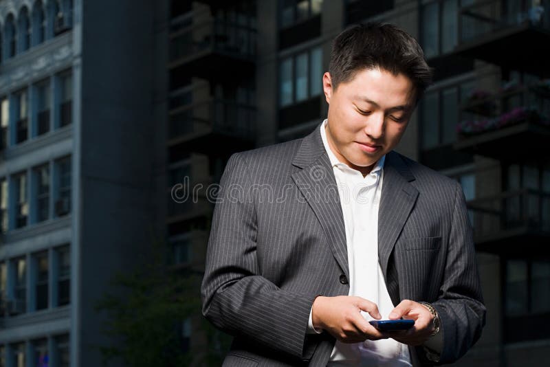 Man Using Handheld Computer Stock Image - Image of people, confidence ...