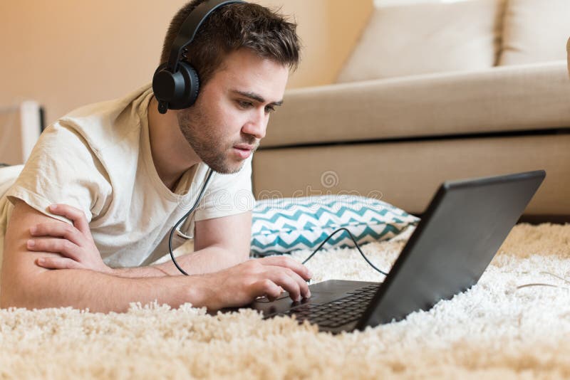 Man using headphones stock photo. Image of headphones - 52105754