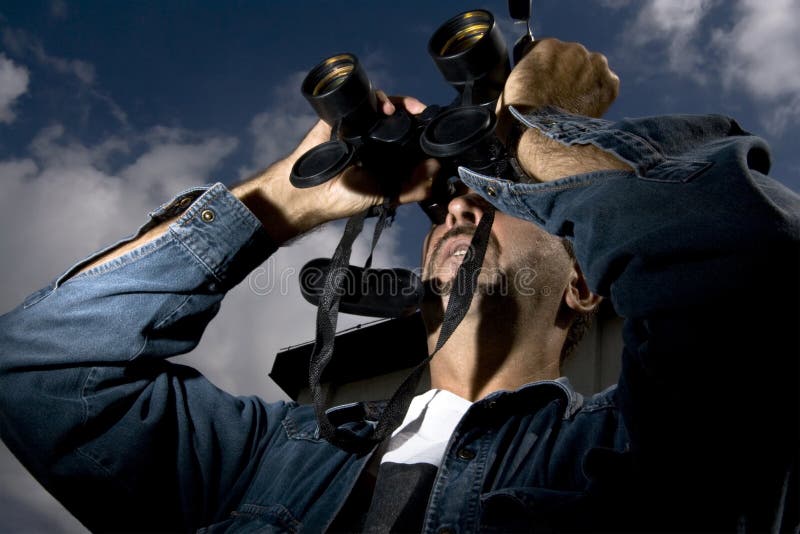 Man using his binoculars stock image. Image of adult, exploring - 3576203