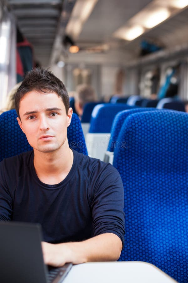 Man Using His Laptop Computer while on the Train Stock Image - Image of ...