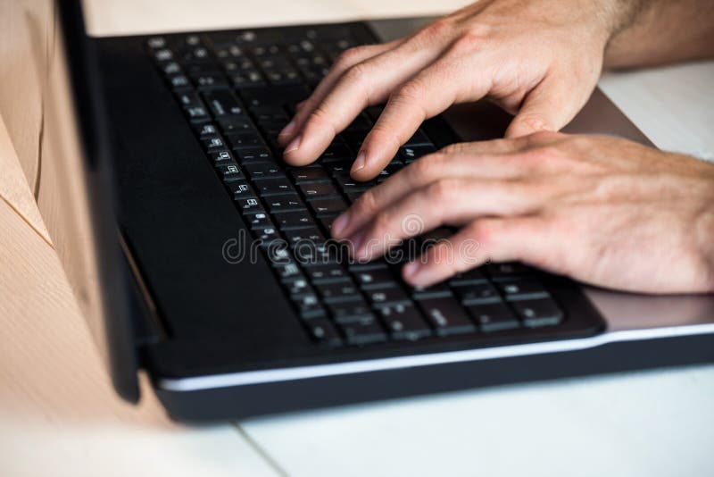 Man using his laptop stock image. Image of technology - 62325637